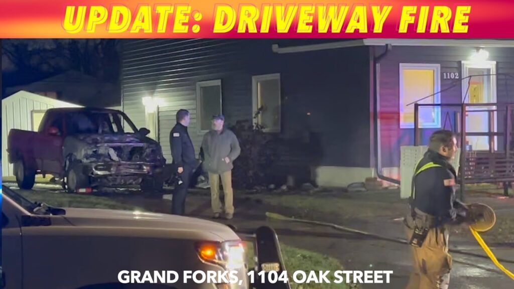BREAKING NEWS UPDATE: Vehicle Fire In Grand Forks Driveway - iNewZ